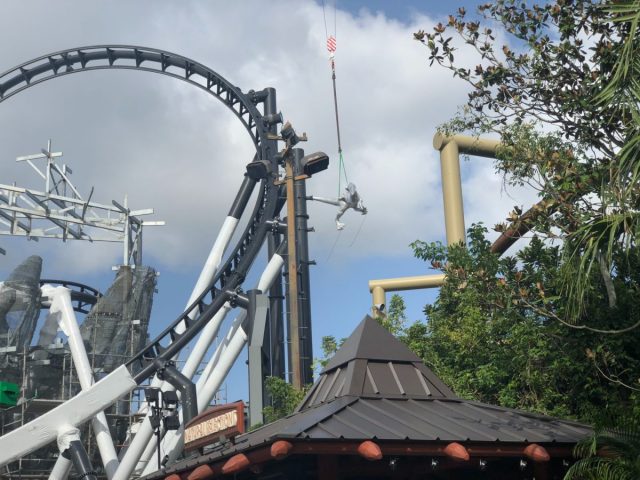 PHOTOS & VIDEO: Raptor Figure Arrives on Site of Jurassic Park Roller ...